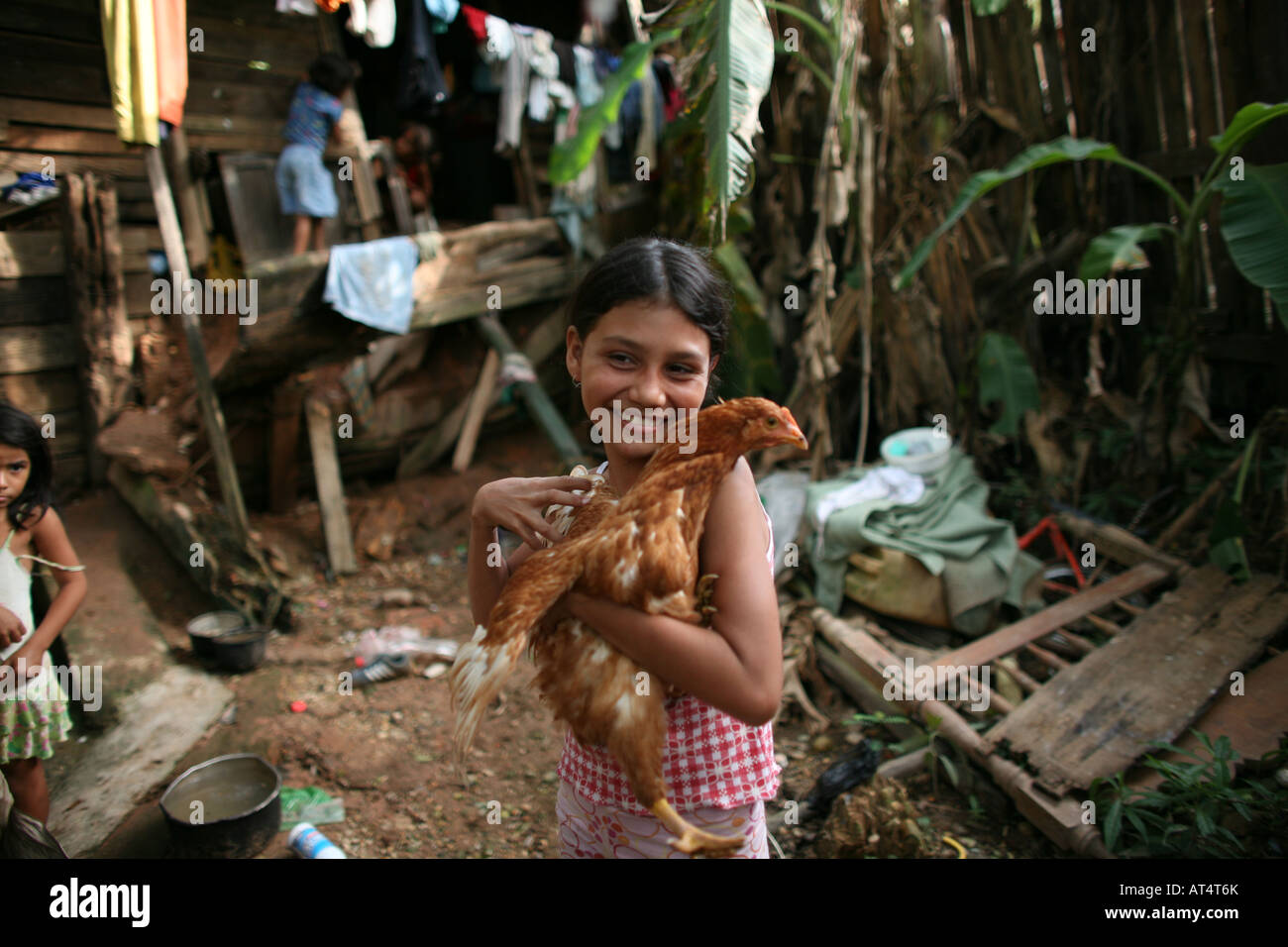 Portrait of a displaced girl in the slums of Colombia Stock Photo - Alamy