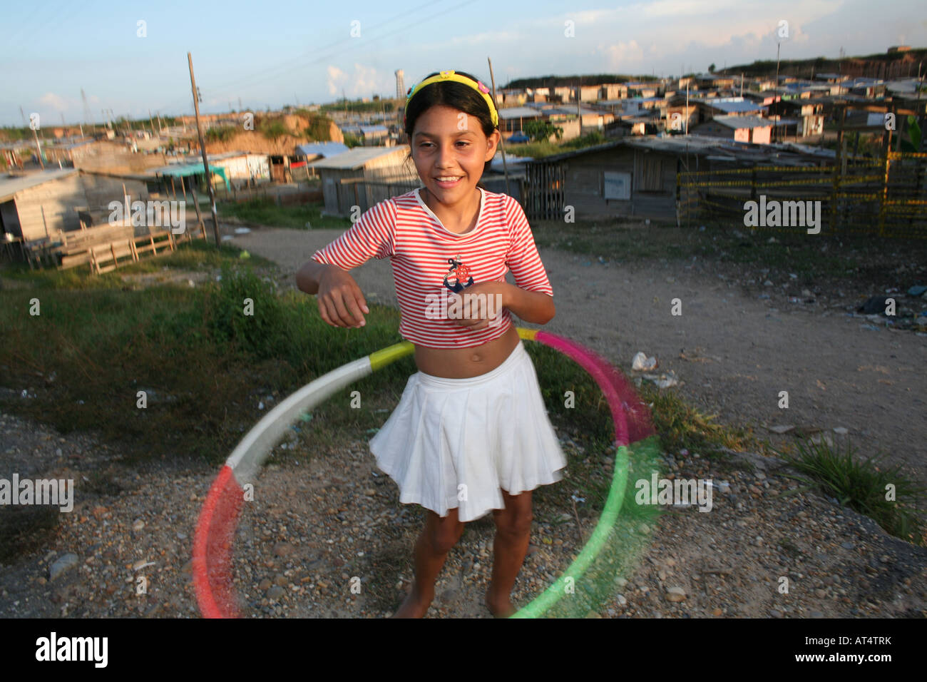 Children playing near a slum in Barrancabermeja Stock Photo - Alamy