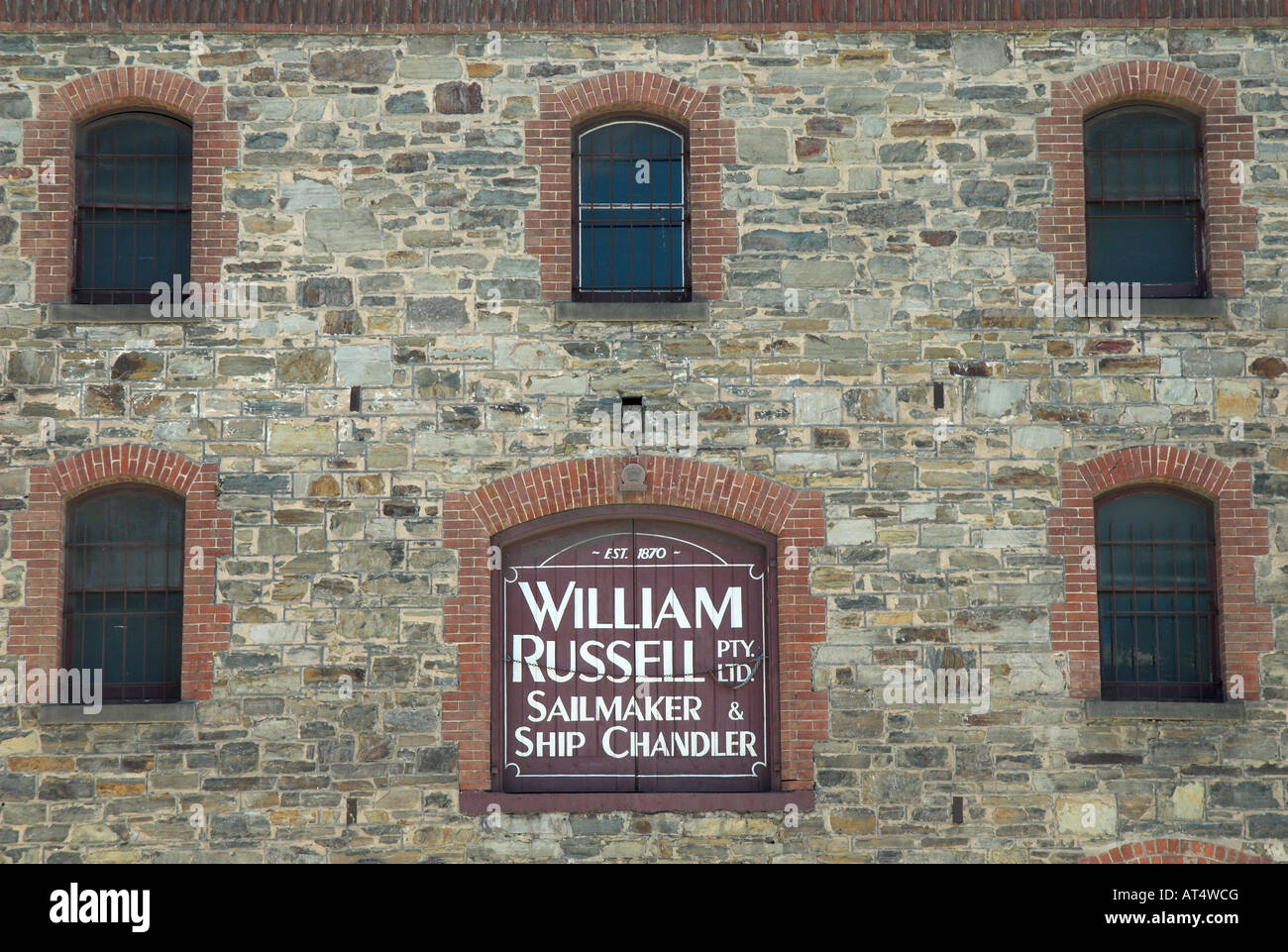 Exterior of an old colonial building, housing a sailmaker and ship ...