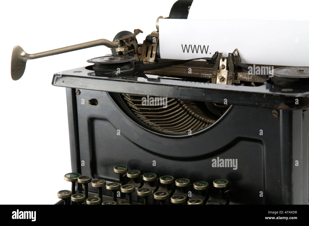 An old ancient typewriter is used to type an internet address Isolated ...