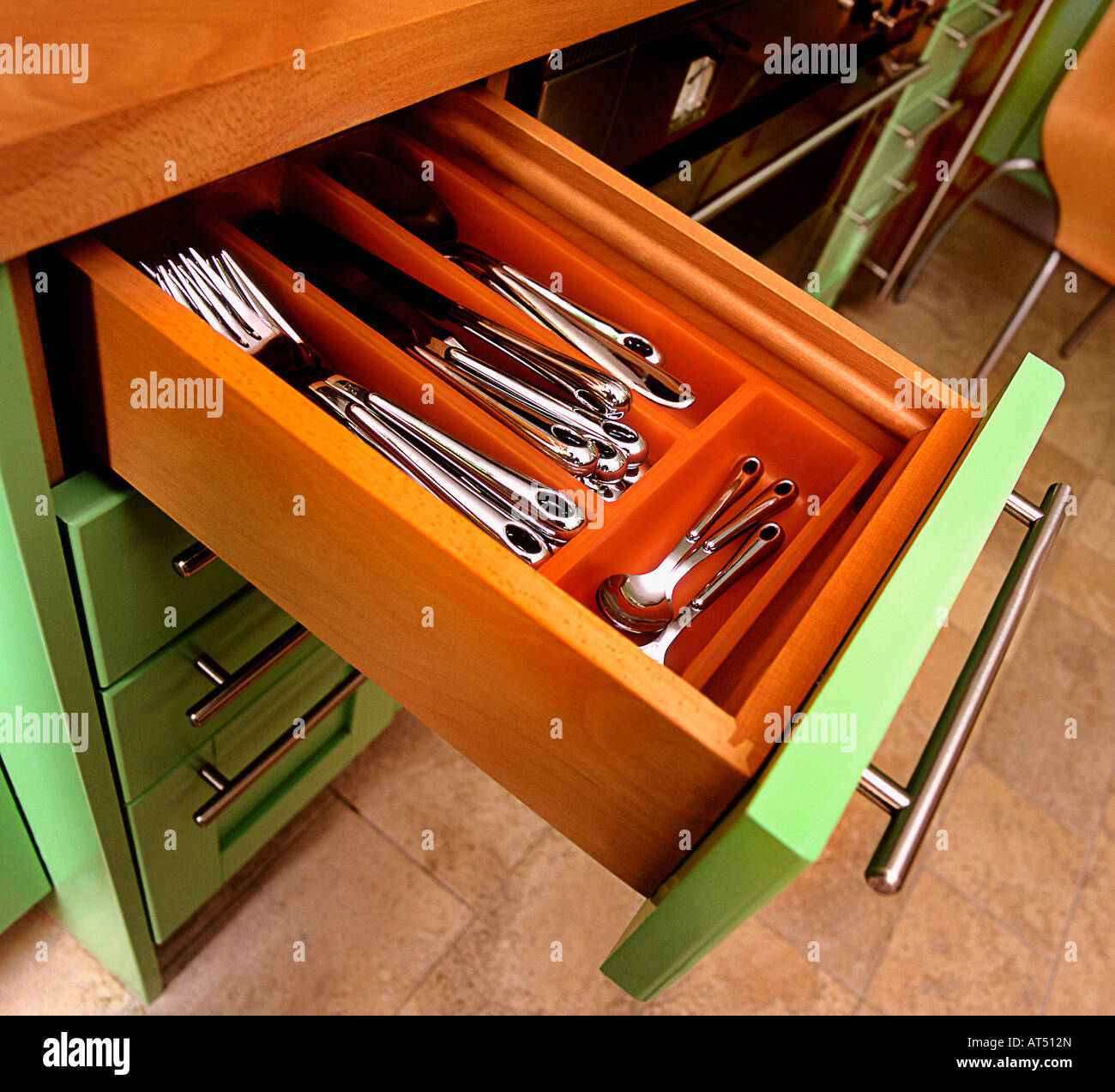 kitchen draw full of knives, forks, and, spoons Stock Photo - Alamy