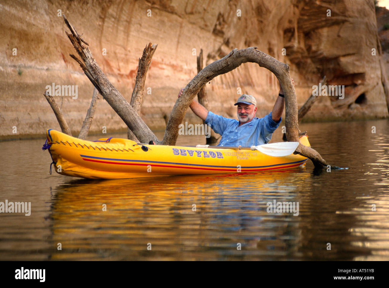 KAYAKER in a secluded arm of ICEBERG CANYON one of the 96 canyons of ...