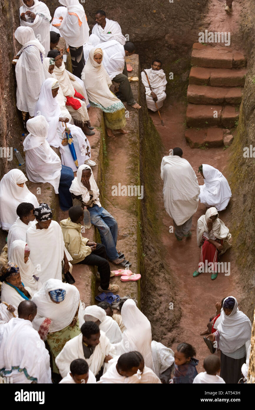 Coptic Christian Faithful Pray at the Wall of St. Michael's Church in ...