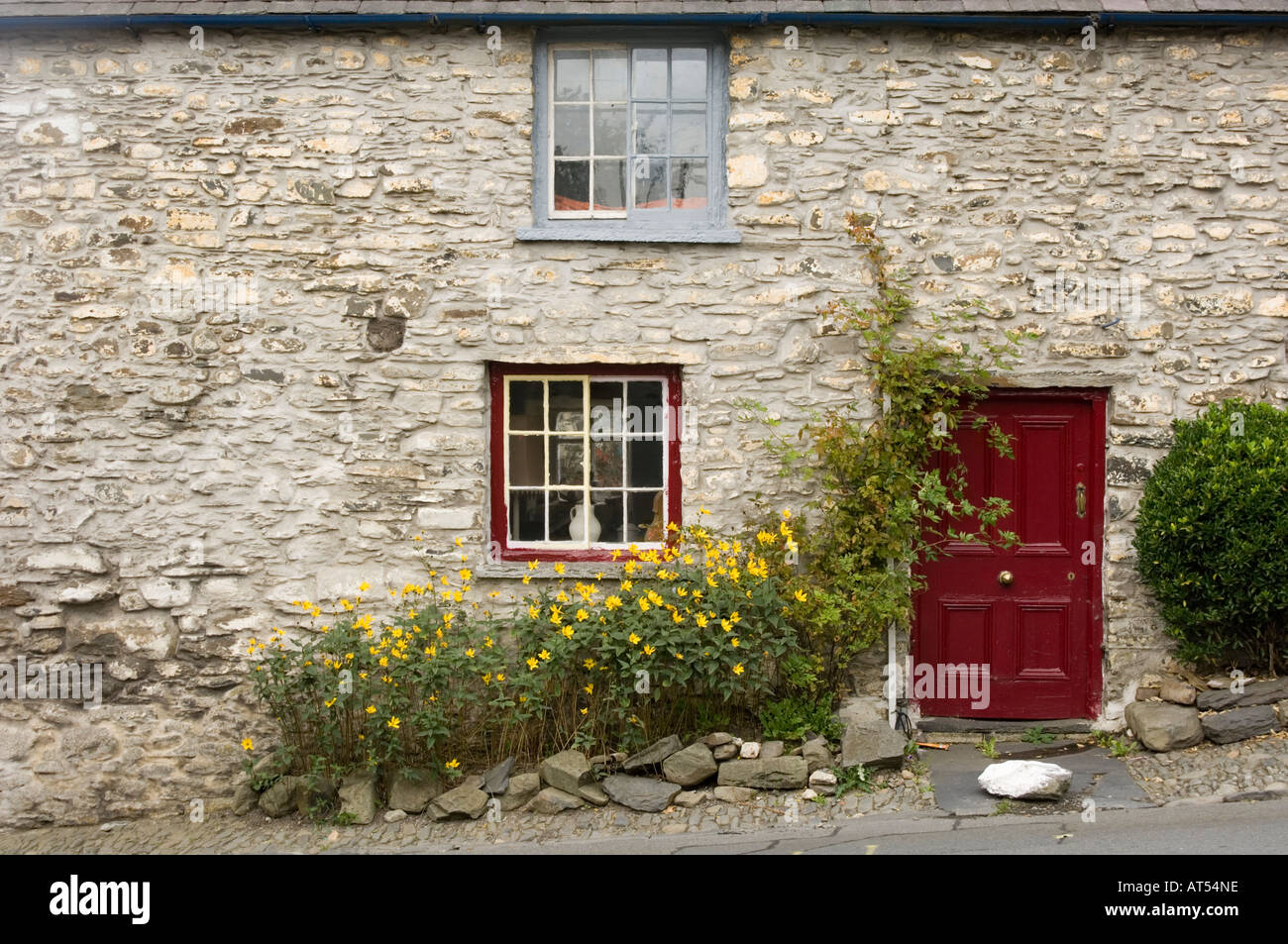 The exterior of an old welsh stone cottage traditionally built Tregaron ...