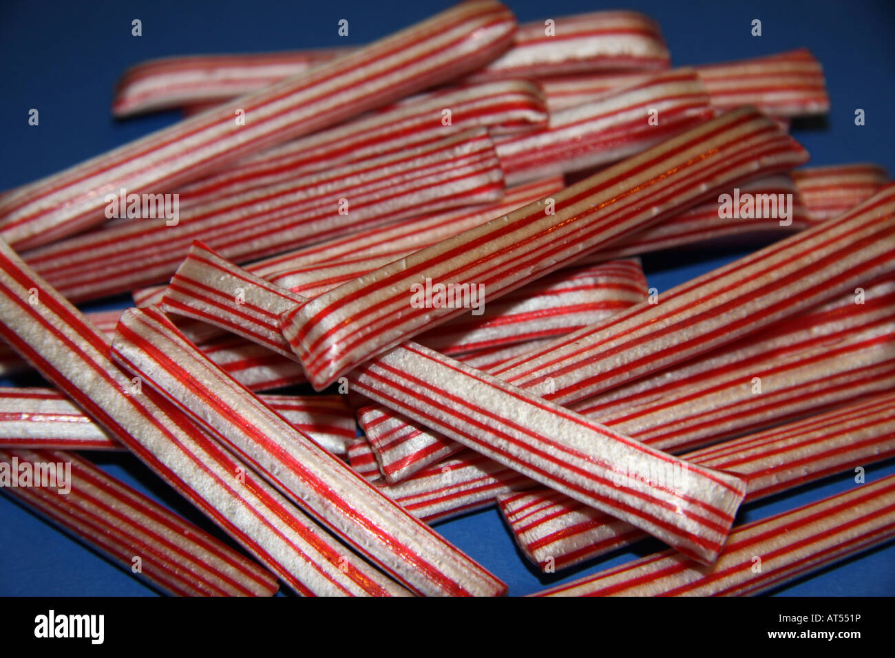 Scattered peppermint sticks Stock Photo - Alamy