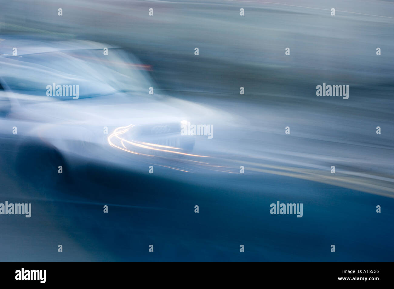 fast moving car, blurred camera pan, slow shutter speed camera ...