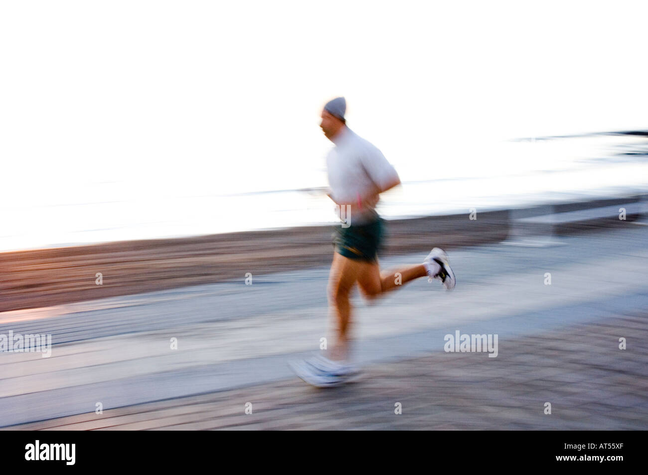 Jogging runner slow shutter speed hi-res stock photography and images ...