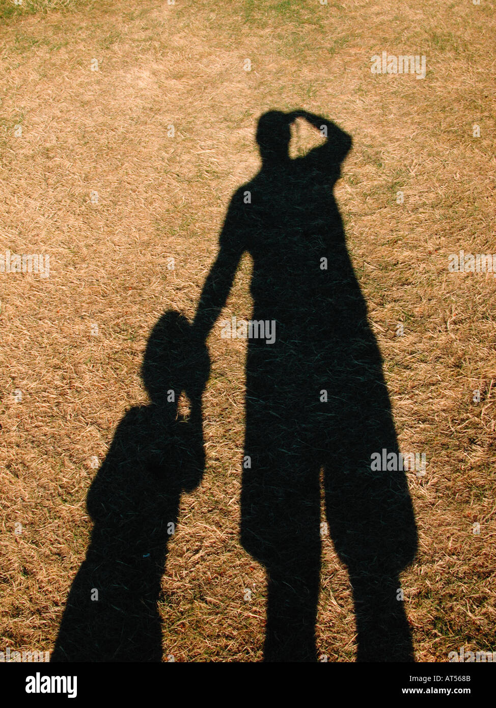 Father son shadows on hi-res stock photography and images - Alamy