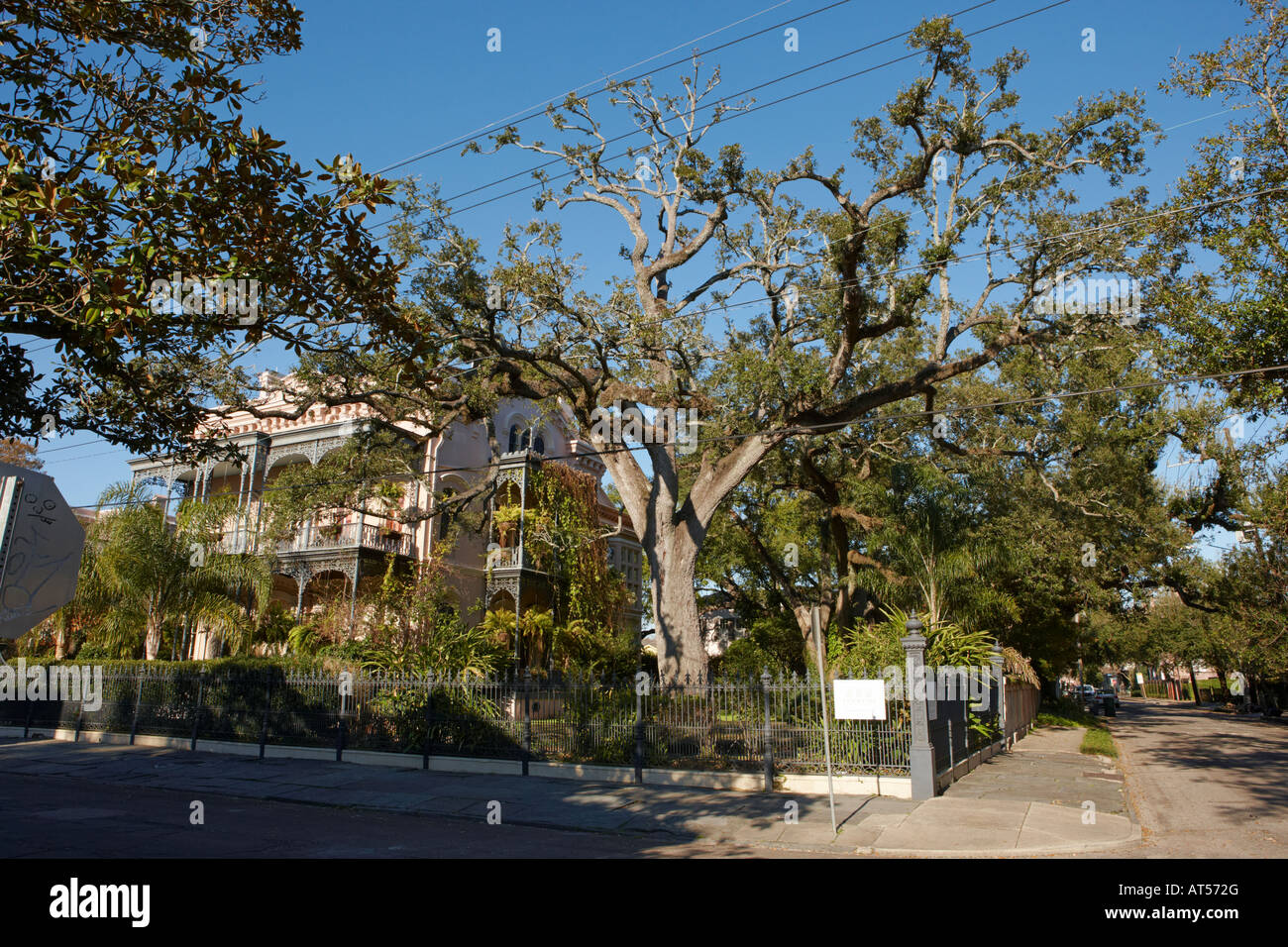 Exterior view of a posh house surrounded by lush greenery in the Garden ...