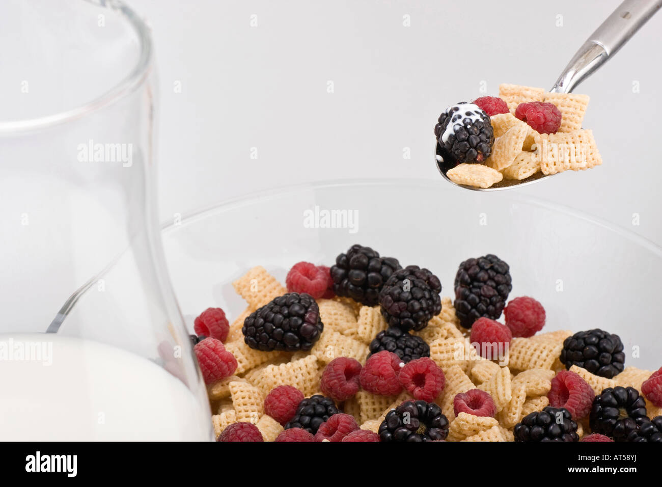 Cereals American simple breakfast glass bowl with a spoon Berry fruits ...