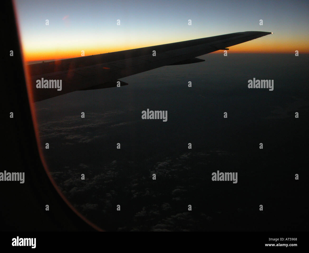 Wing at sunset Stock Photo - Alamy