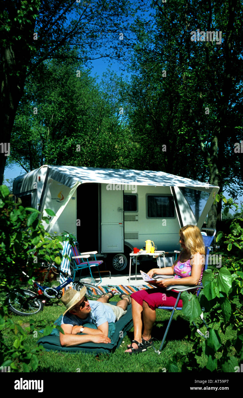Man woman Holiday provence camping ground caravan site Stock Photo - Alamy