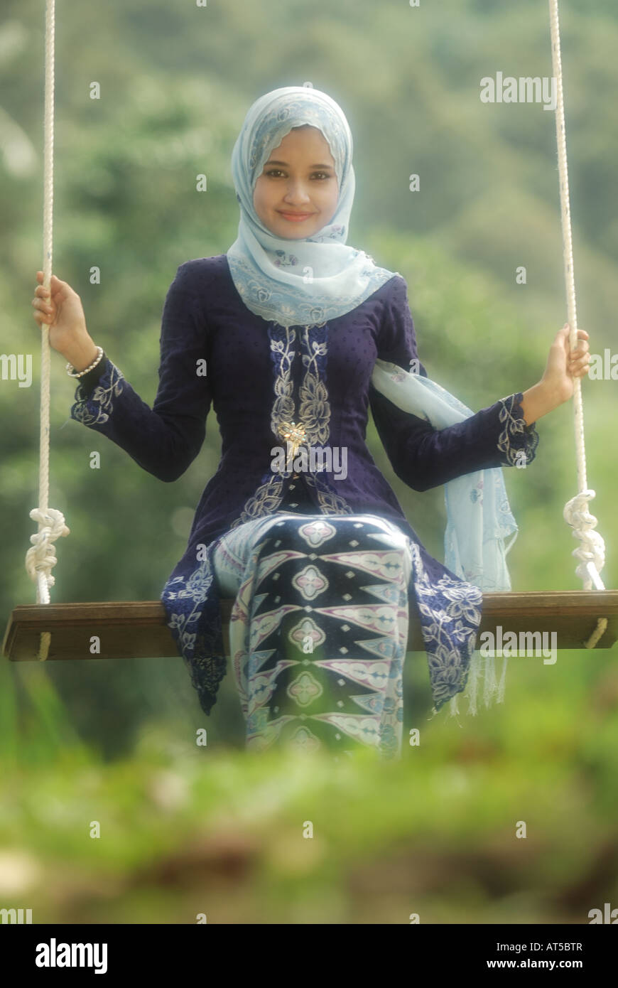 Cute Malaysian Girl with Scarf And Wear Modern Kebaya And Batik Stock ...