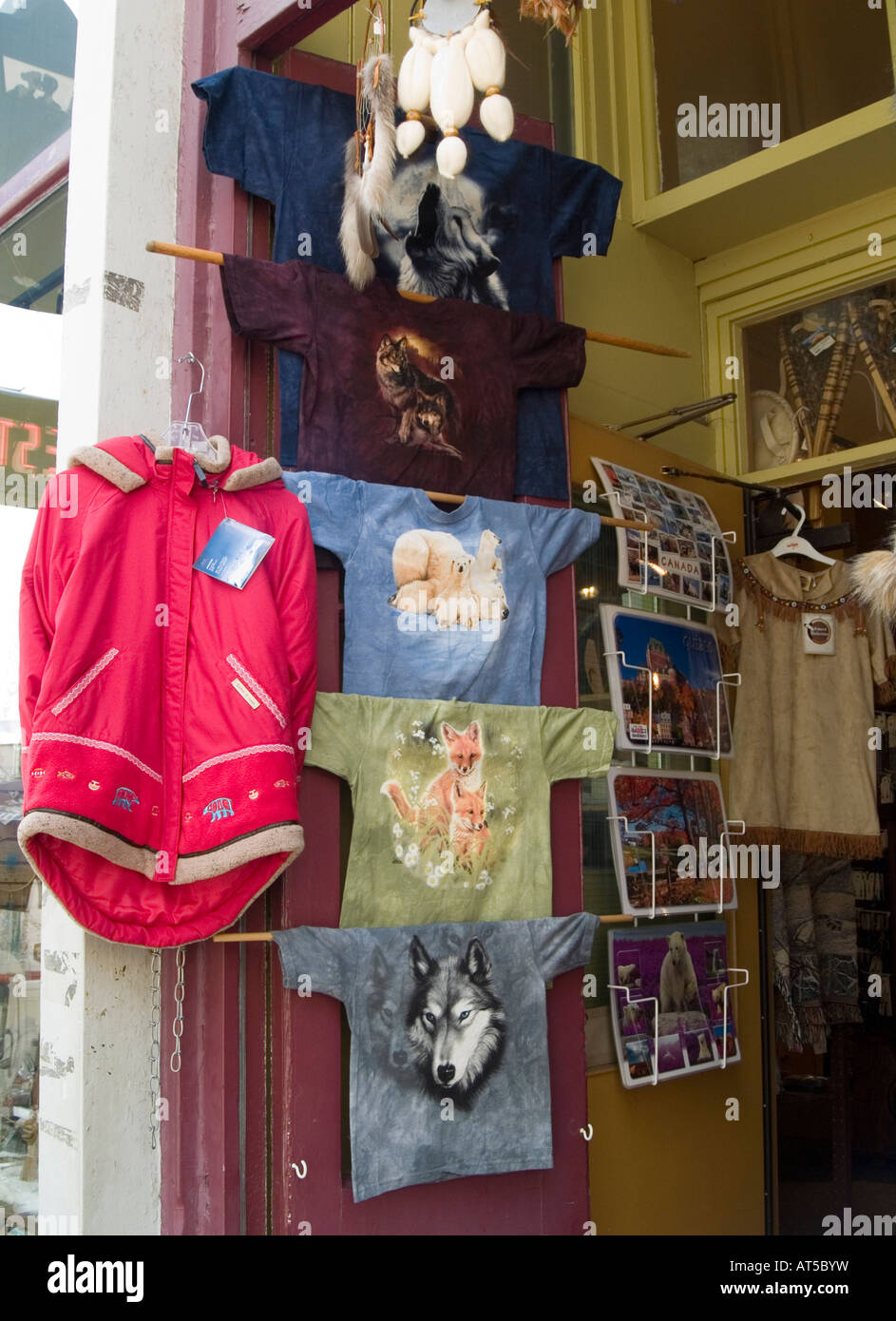 T-shirts and souvenirs for sale in a gift shop in the Lower Town area ...