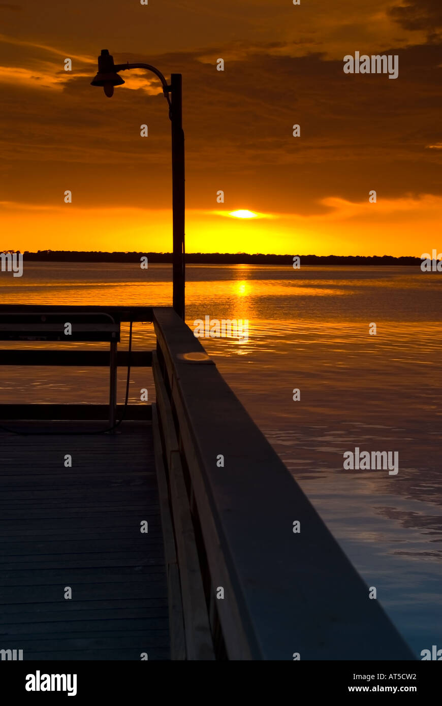 Sunset at the dock Stock Photo - Alamy