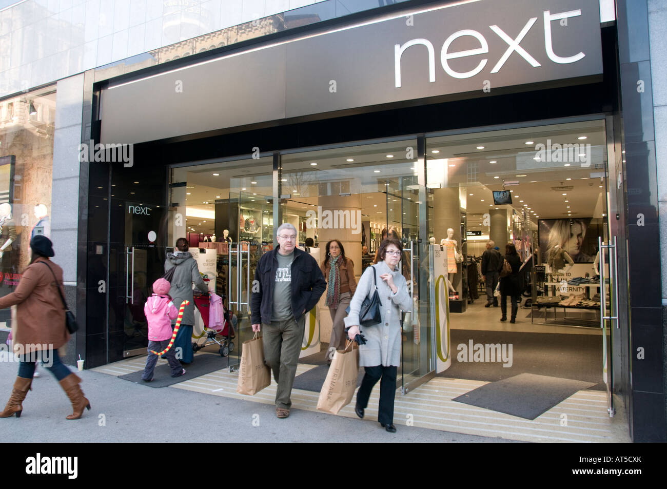 People shopping at NEXT Liverpool city centre UK Stock Photo - Alamy
