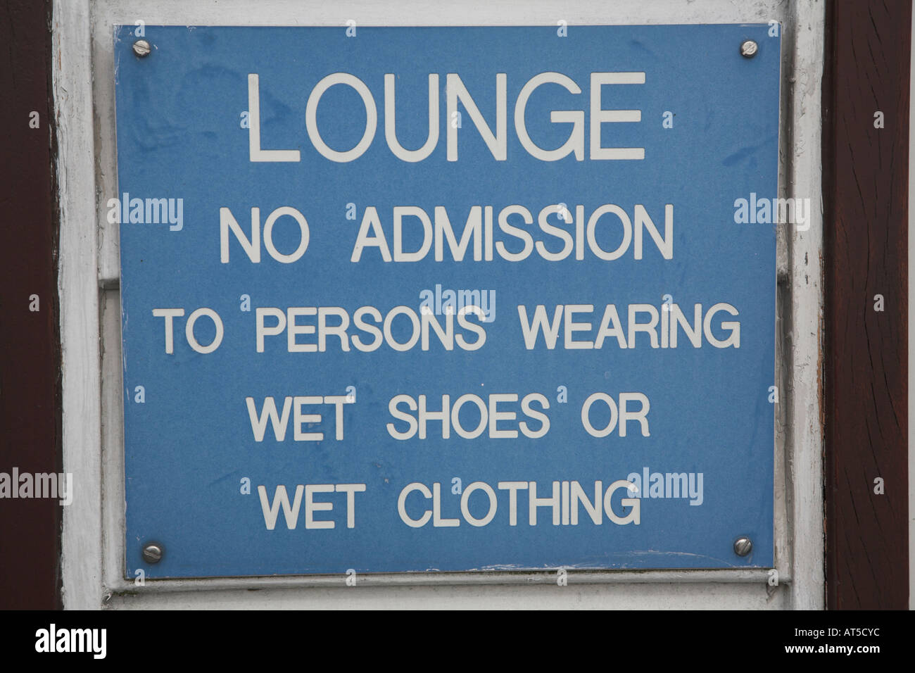Blue sign in sailing club 'Lounge no admission to persons wearing wet ...