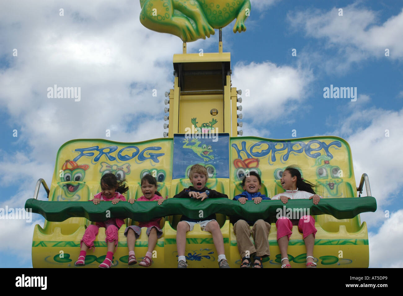 Children plummet frog hopper down at Deno s amusement ride at Coney ...