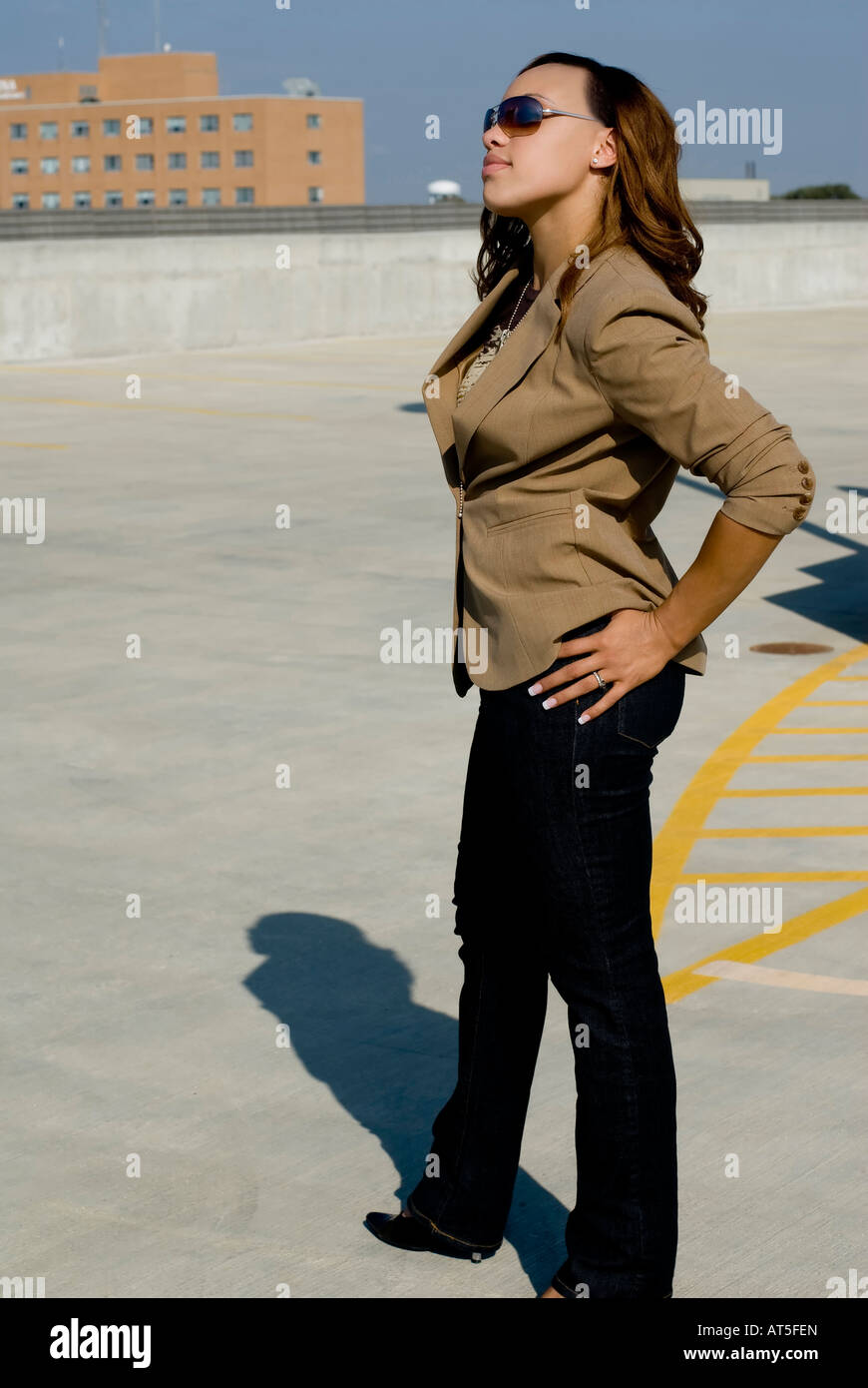 Fashion model with attitude posing outside Stock Photo - Alamy