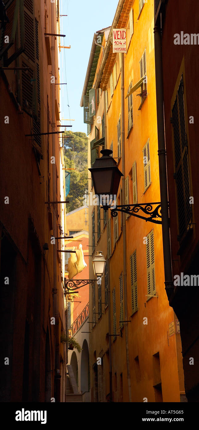 Narrow street in reflected light Old town Nice France Stock Photo - Alamy