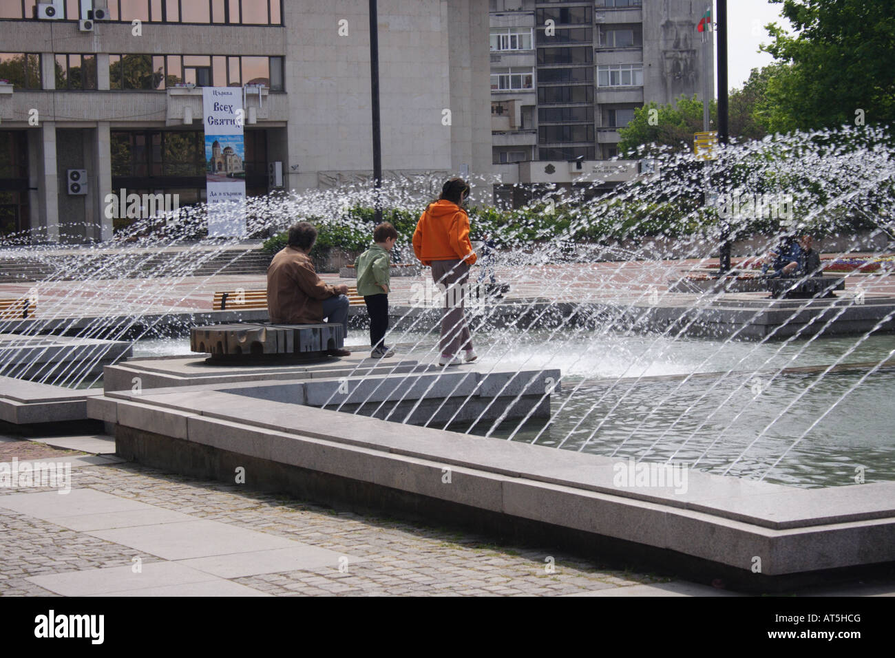 fountain, water, splashing water, center, square Stock Photo - Alamy