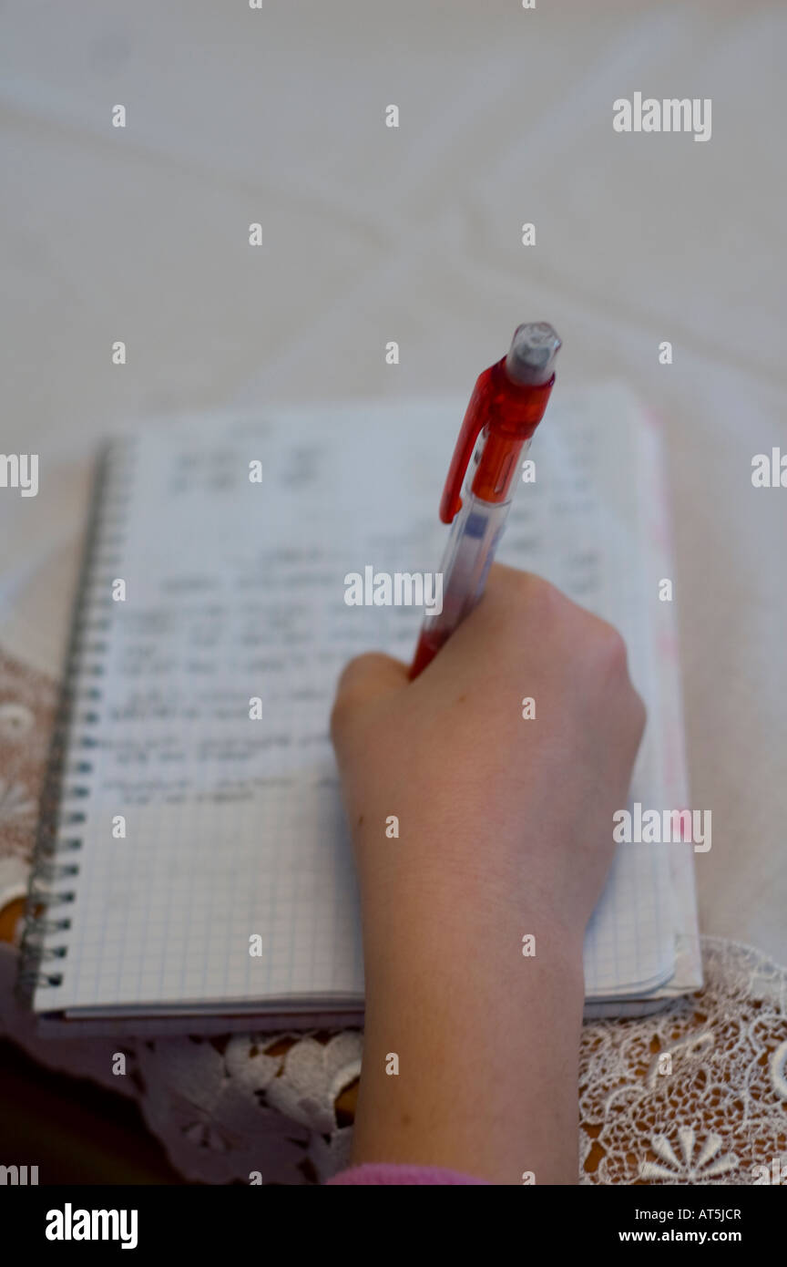 Young girl doing math homework Stock Photo - Alamy