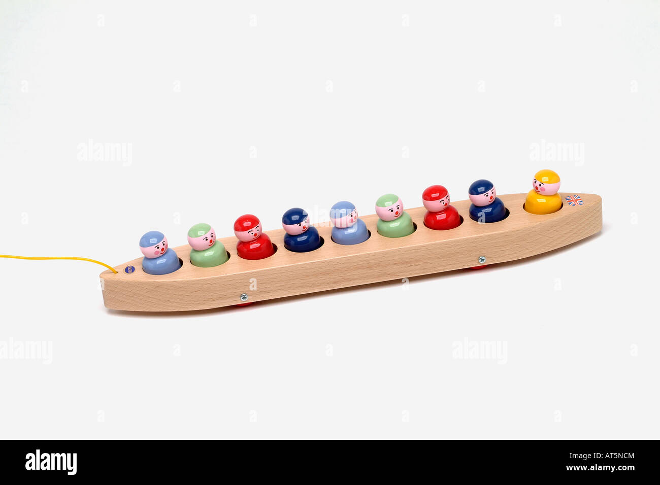 Child's wooden pull along row boat toy Stock Photo - Alamy