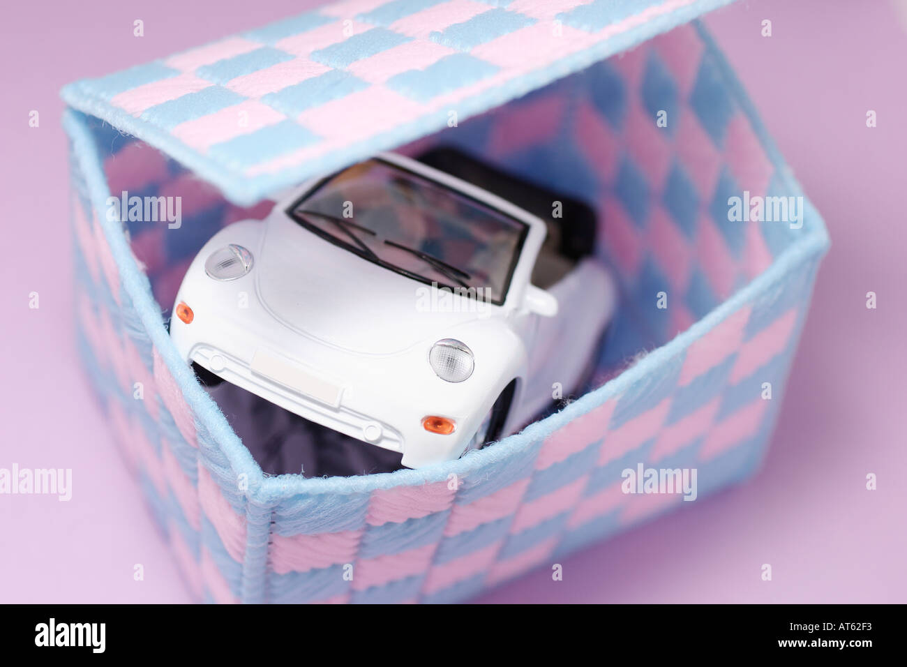 Toy Car in Basket Stock Photo - Alamy
