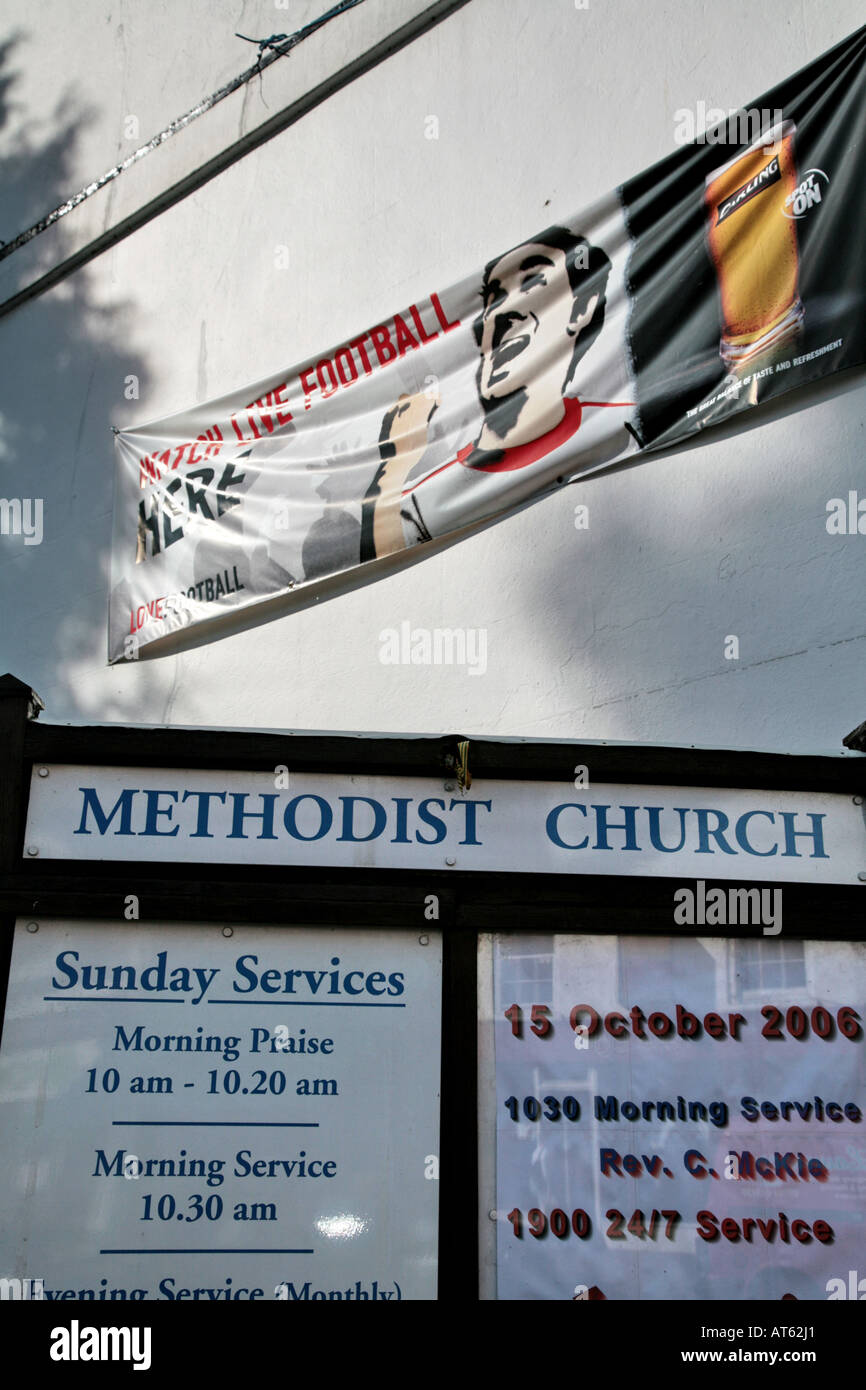 Beer and football banner above notice board for methodist church Stock ...