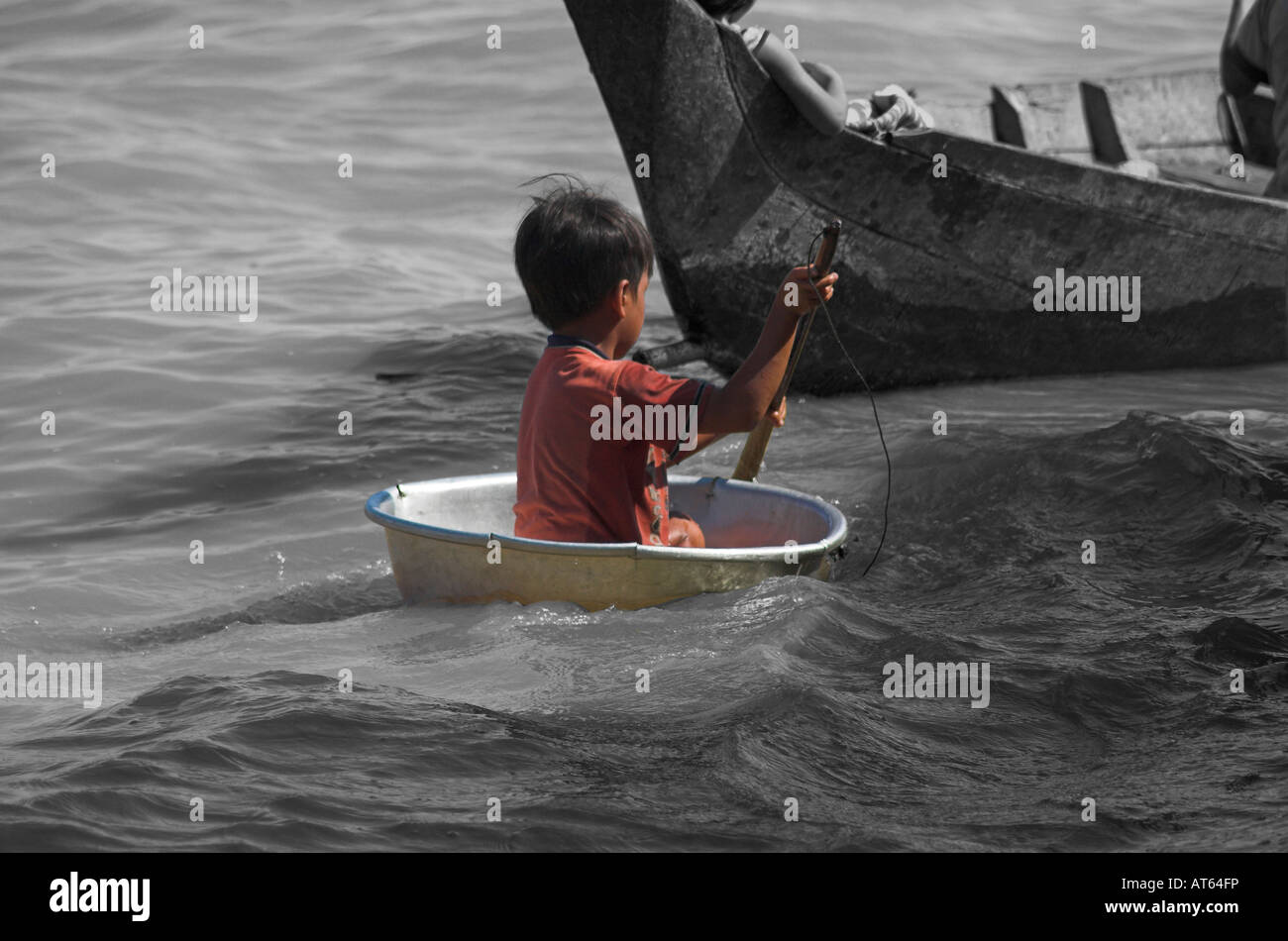 young child in home made boat Stock Photo - Alamy