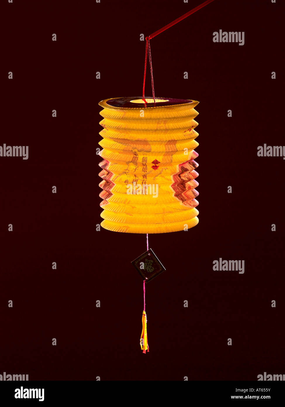 a yellow lantern with dark background Stock Photo - Alamy