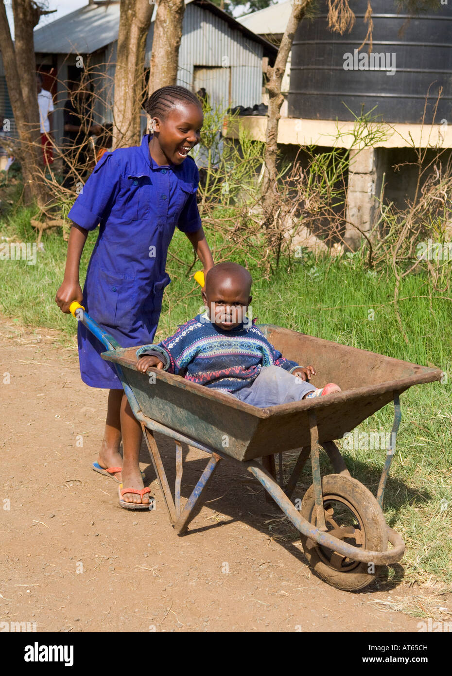 Wheelbarrows children hi-res stock photography and images - Alamy