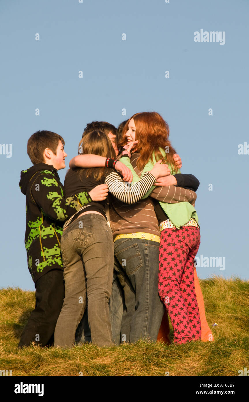 Children having group hug on hi-res stock photography and images - Alamy