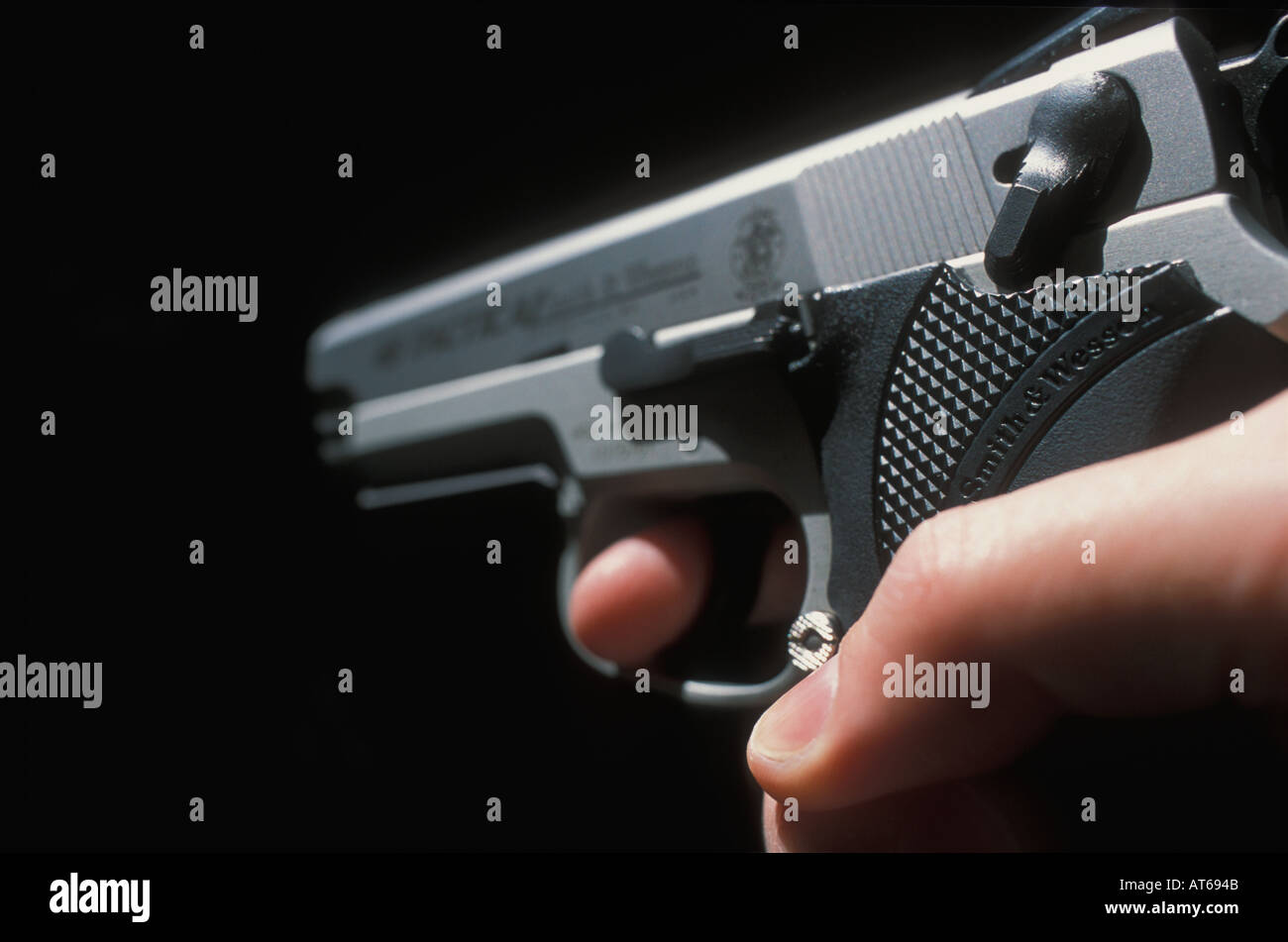 Automatic pistol handgun being pointed and ready to fire pull the ...