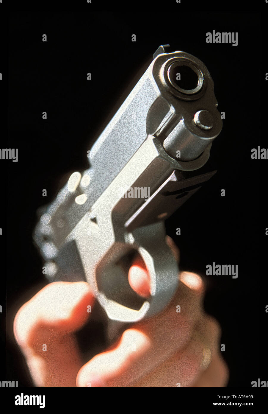 Semi automatic pistol being pointed and ready to fire Stock Photo - Alamy