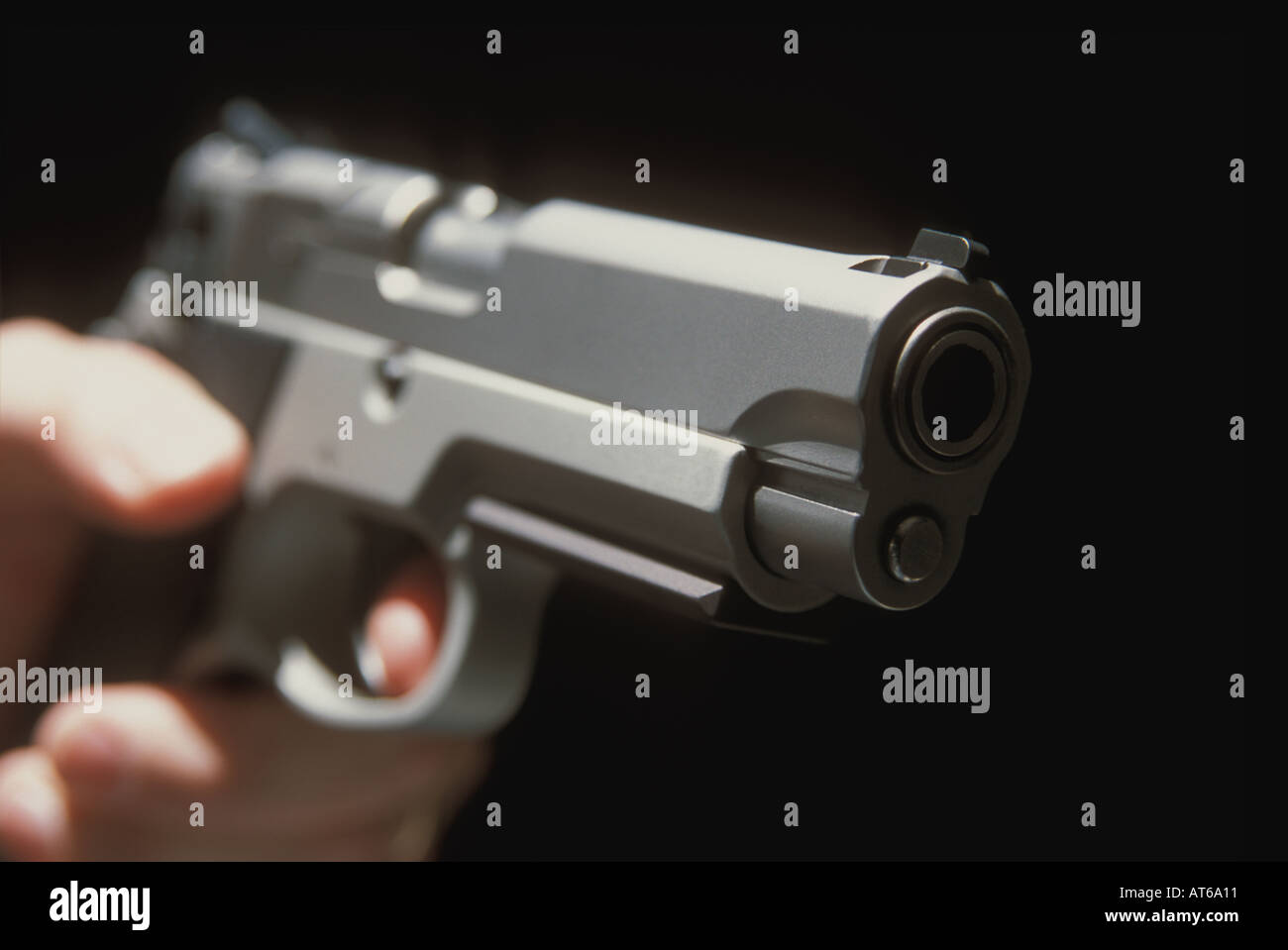 Automatic pistol handgun being pointed and ready to fire pull the ...