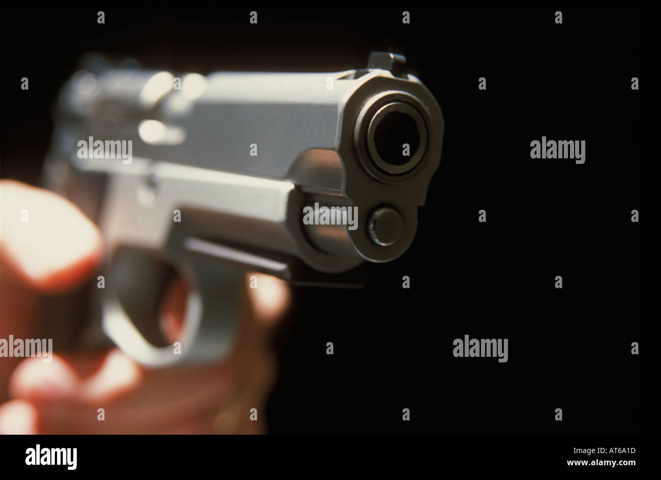 Automatic pistol handgun being pointed and ready to fire pull the ...