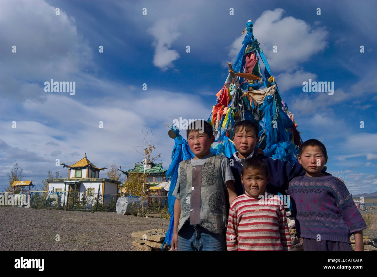 Young boys in front of a Buddhist temple Stock Photo - Alamy