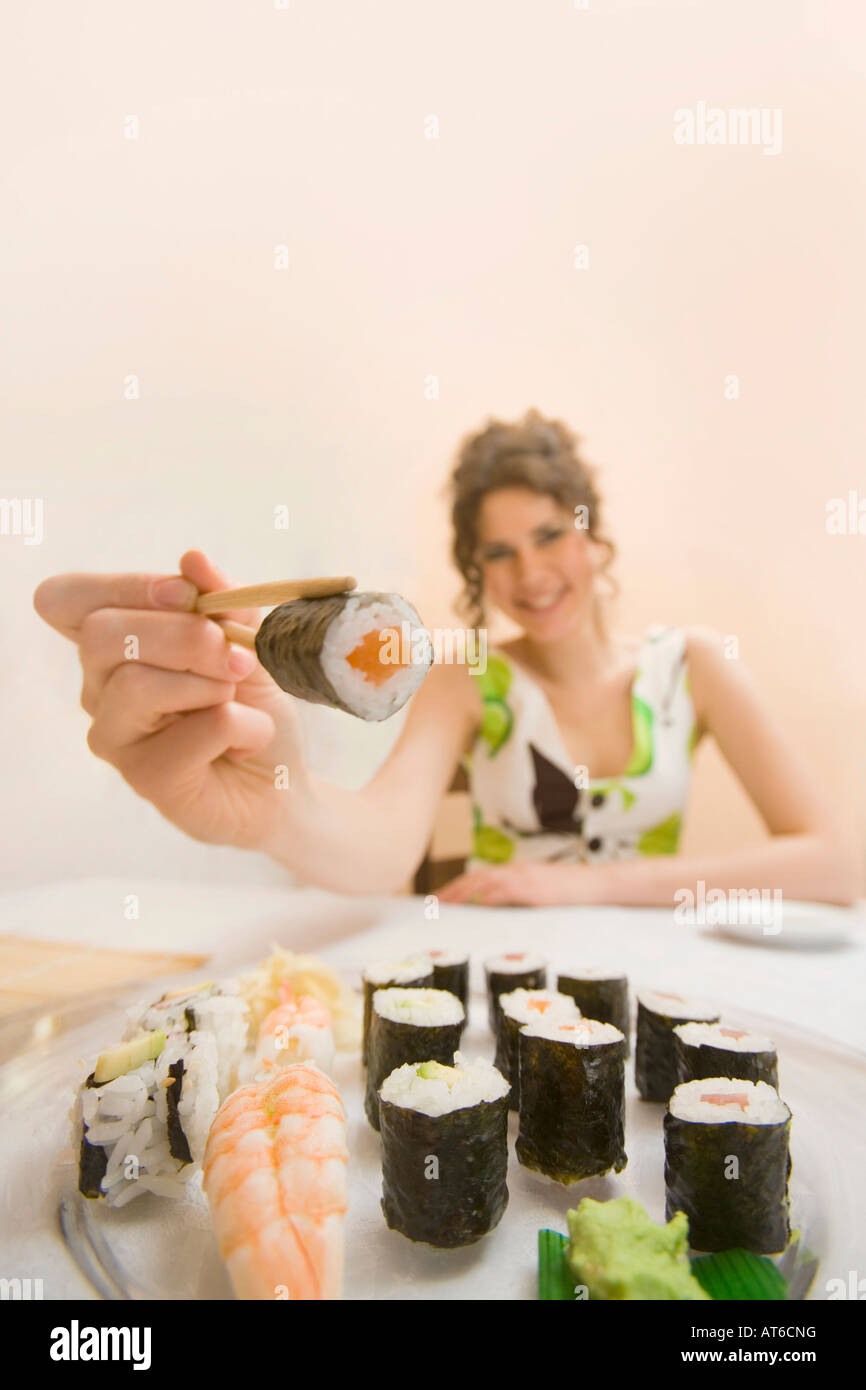 Human hands holding plate sushi hi-res stock photography and images - Alamy
