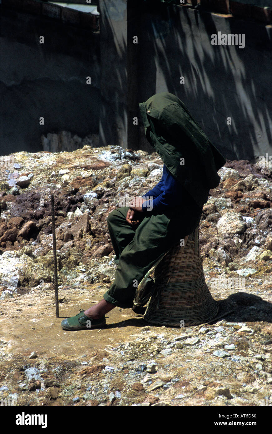 A construction worker taking a rest in a construction site in Kunming ...