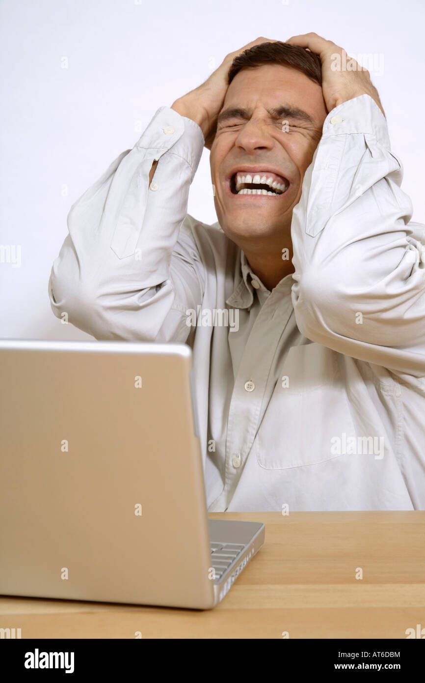 Man using laptop, portrait Stock Photo - Alamy