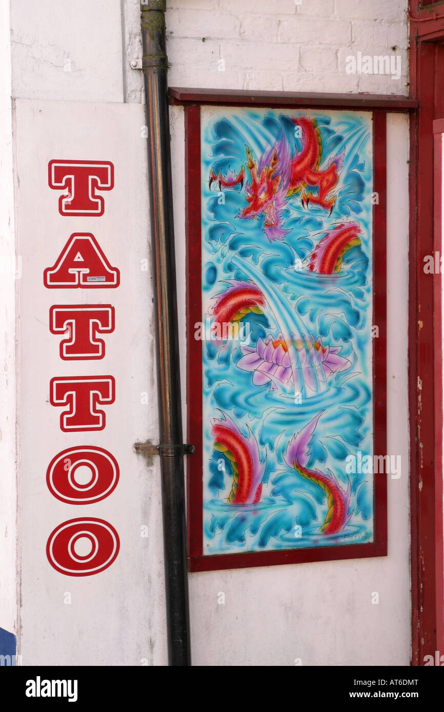 Signage at the entrance of a tattoo artist Stock Photo - Alamy