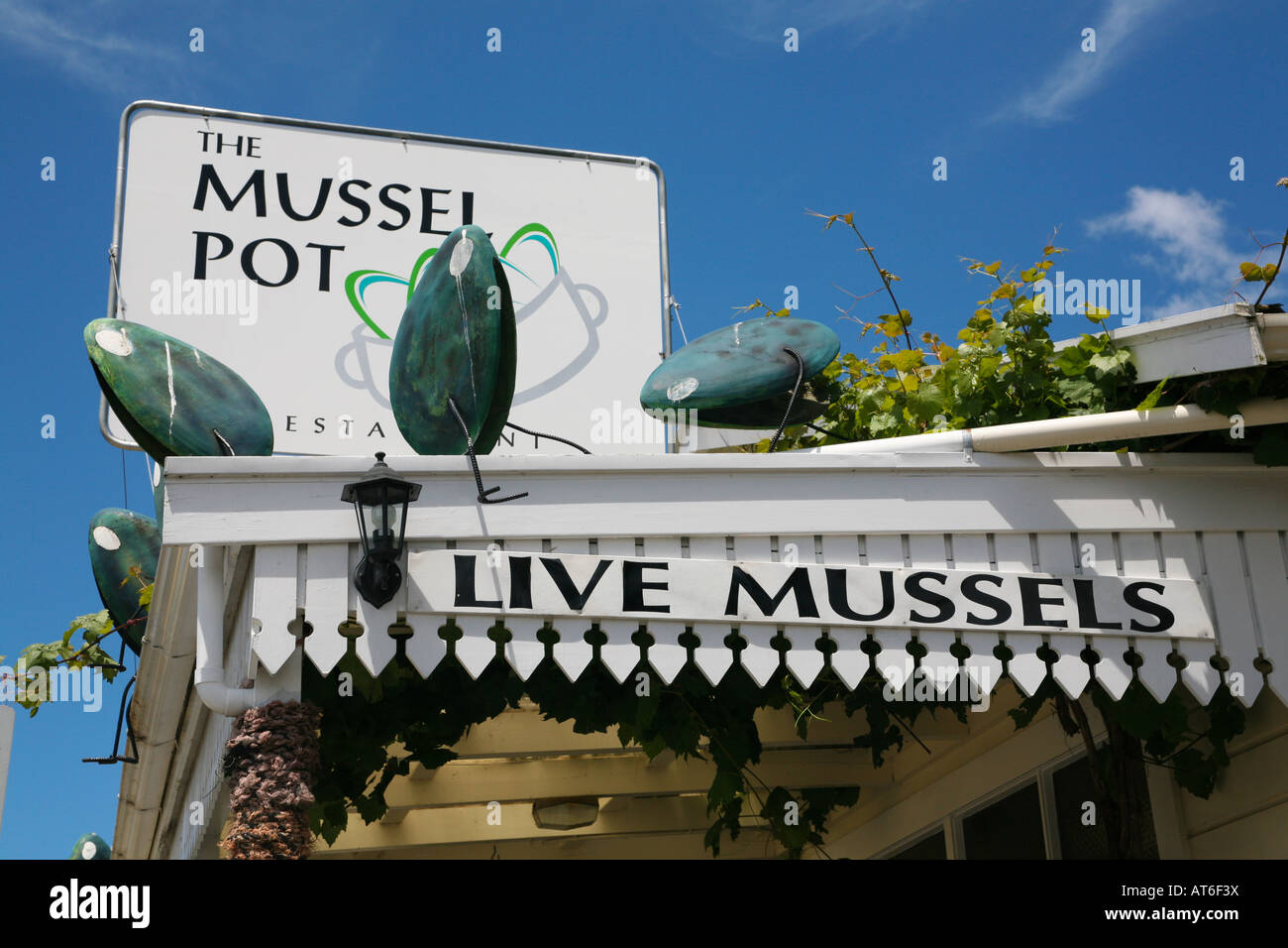 Metal mussel sculptures adorn the roof of "The Mussel Pot" restaurant ...