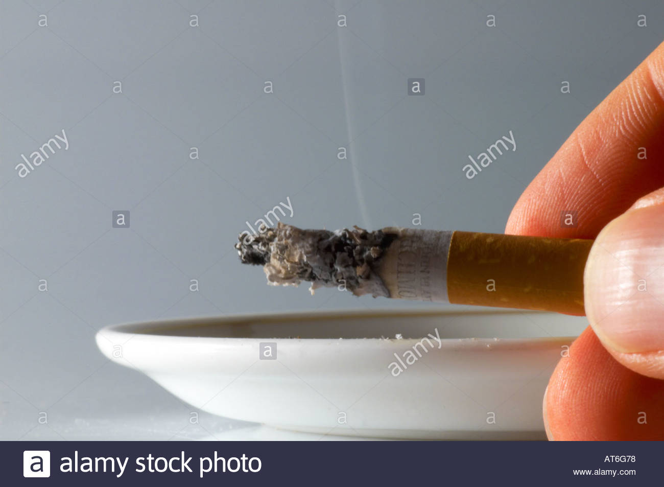 Smoking a cigarette Stock Photo - Alamy