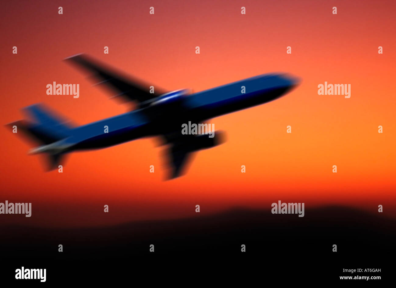 Airplane traveling at the sunset Stock Photo - Alamy