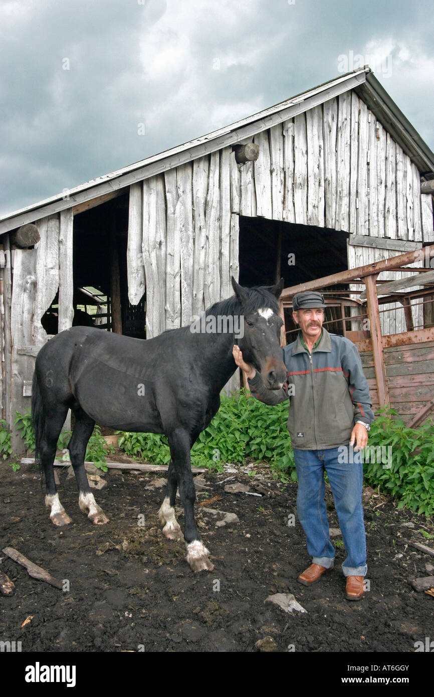 koumiss farmer and horse Buzat village Kiginski region Republic of ...