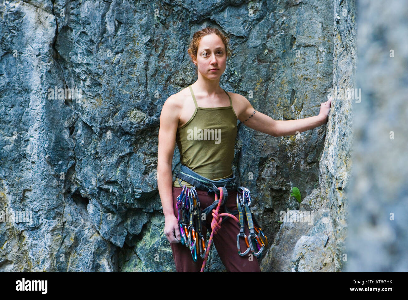 Portrait of a late 20 s woman ready to strt a rock climb Model Release ...