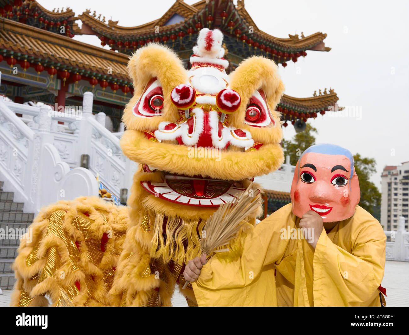 lion dance performers posing to camera Stock Photo - Alamy