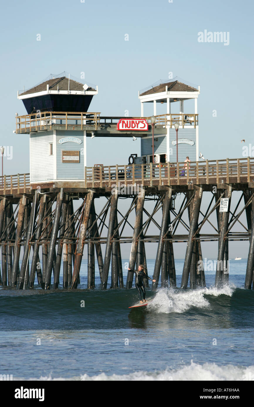 SURFING AT OCEANSIDE BEACH AND PIER LOS ANGELES CALIFORNIA Stock Photo ...