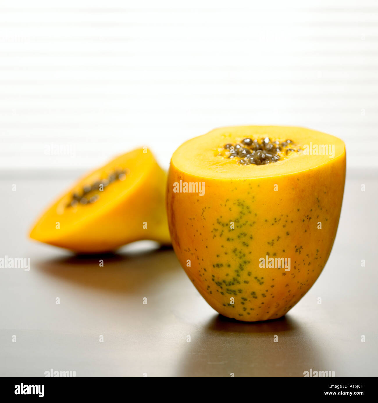 Sliced papaya, close-up Stock Photo - Alamy